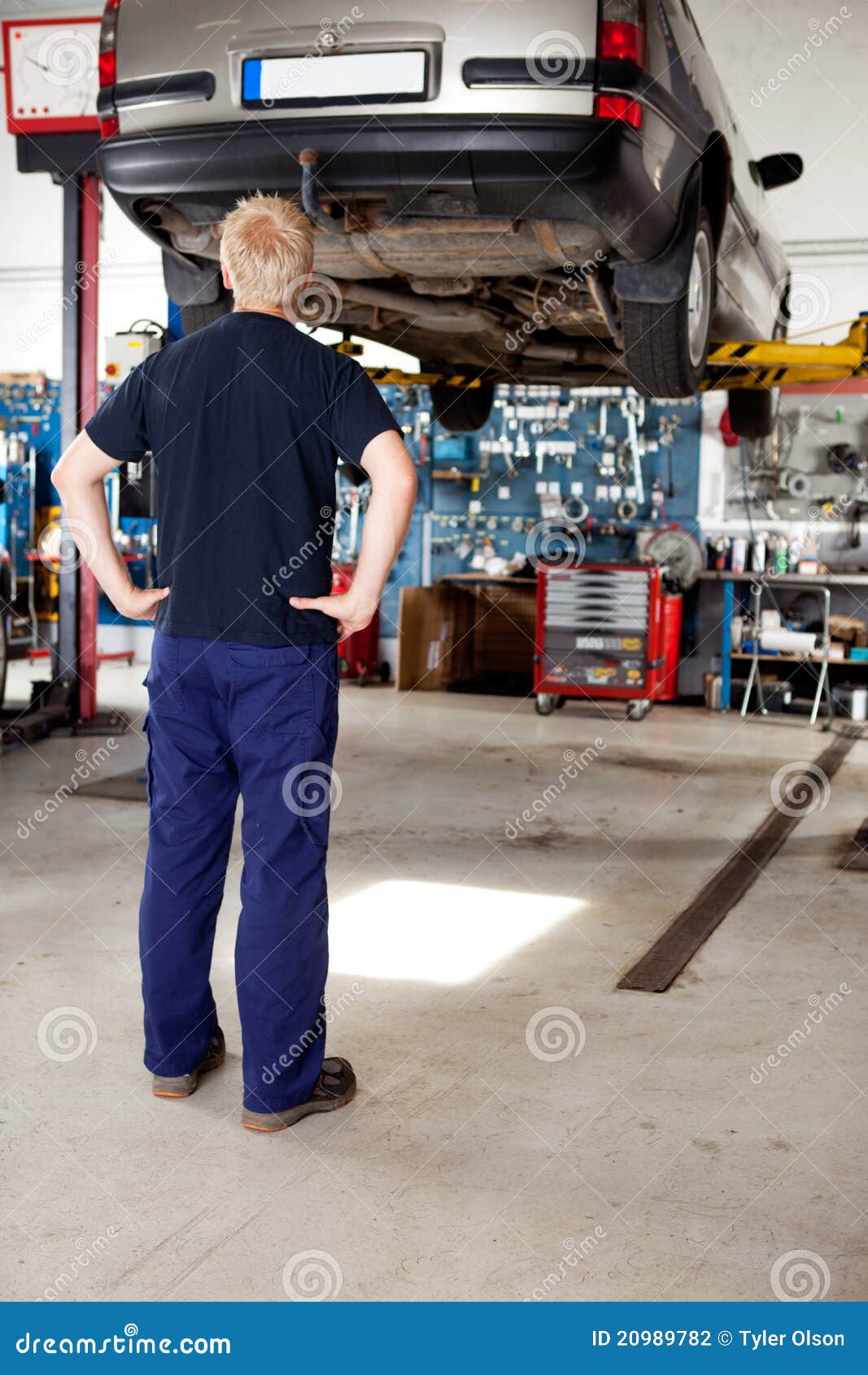Mechanic Looking at Car stock photo. Image of shop, caucasian - 20989782