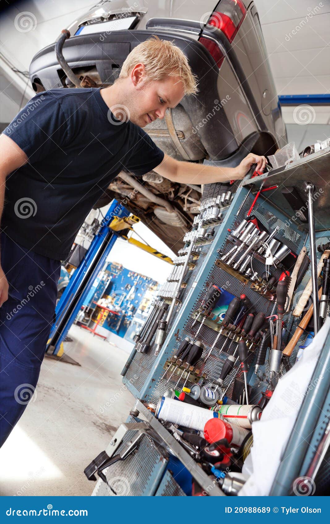 Mechanic Looking for Tool stock image. Image of modern - 20988689