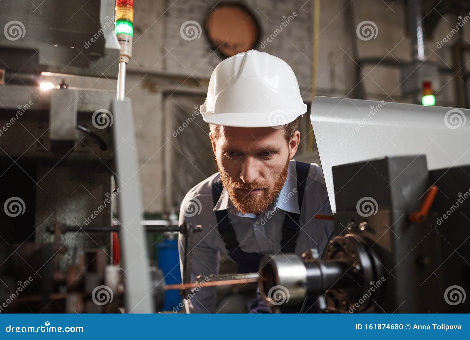 Mechanic Looking at the Work of Machine Stock Photo - Image of adult ...