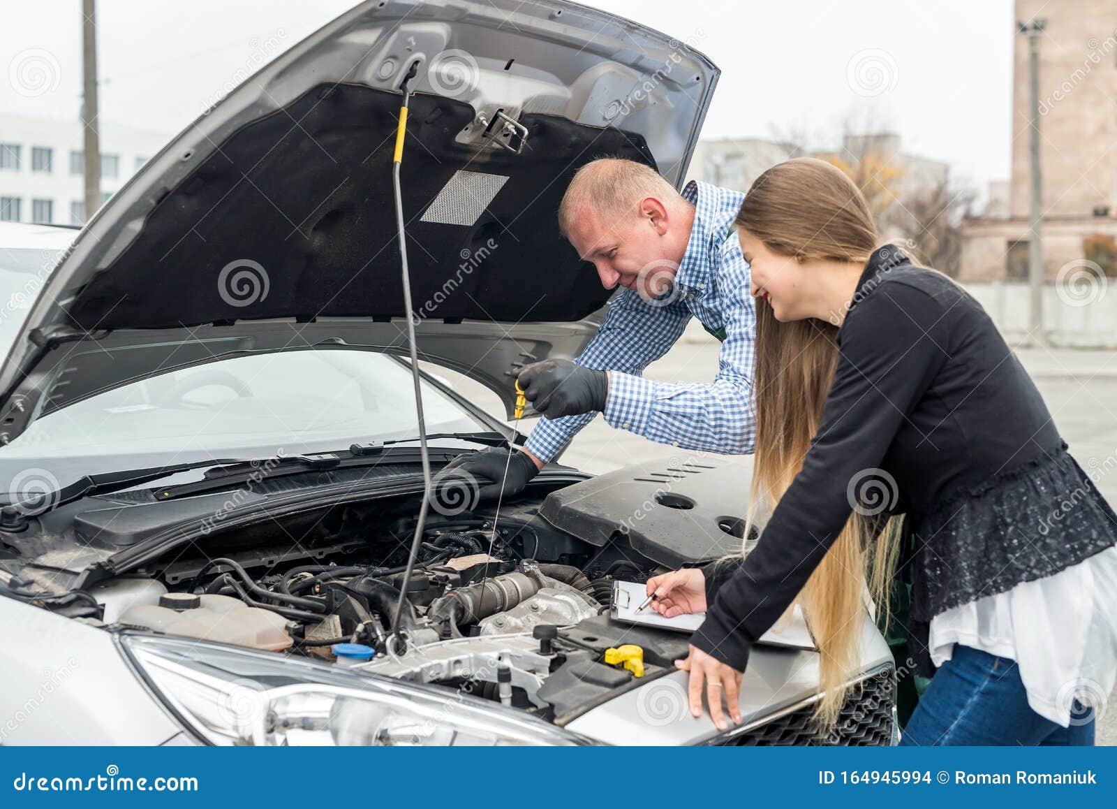 Mechanic Man Inspecting Car Engine with Customer Stock Photo - Image of ...