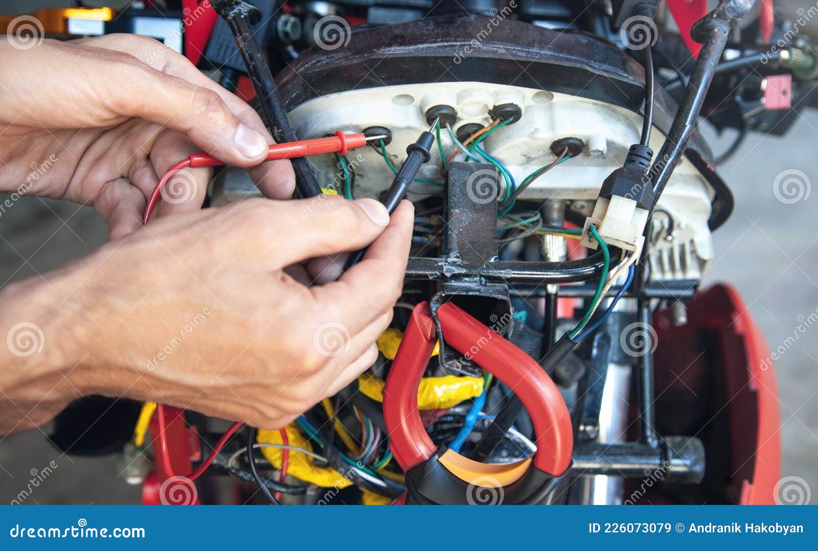 Mechanic Man Wiring the Electrical Cables Motorcycle Stock Image ... Mechanic Man Wiring the Electrical Cables Motorcycle Stock Image ...