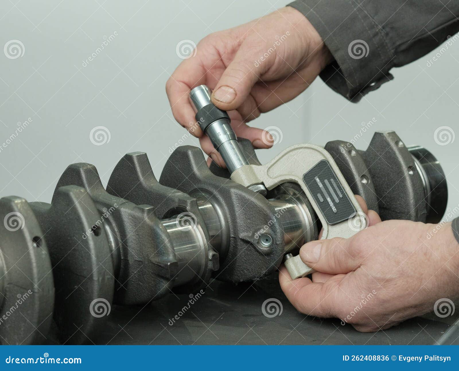 The Mechanic Measures the Crankshaft Neck. Stock Photo - Image of ...