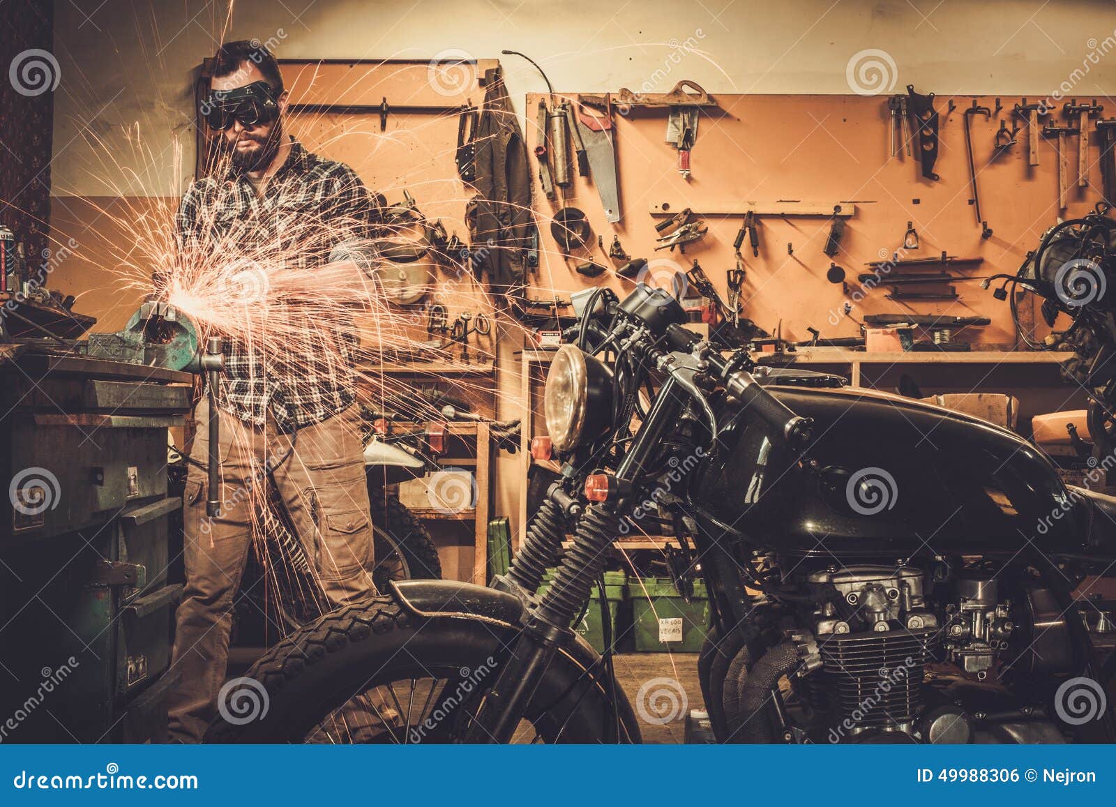 Mechanic at Motorcycle Customs Garage Stock Photo - Image of garage ...