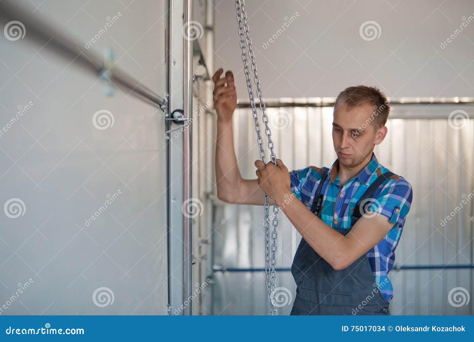 Mechanic Open a Garage Door Stock Photo - Image of painted, install ...