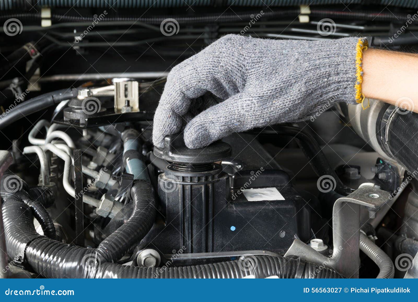 A Mechanic is Opening the Oil Cap from a Car Engine. Stock Image ...