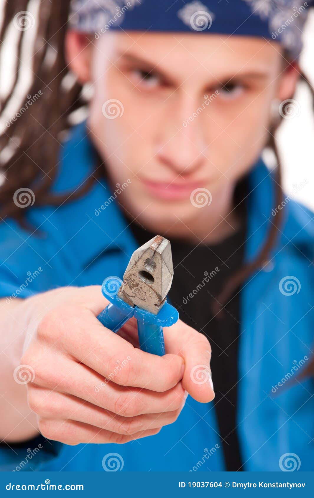 Mechanic with pliers stock photo. Image of work, young - 19037604