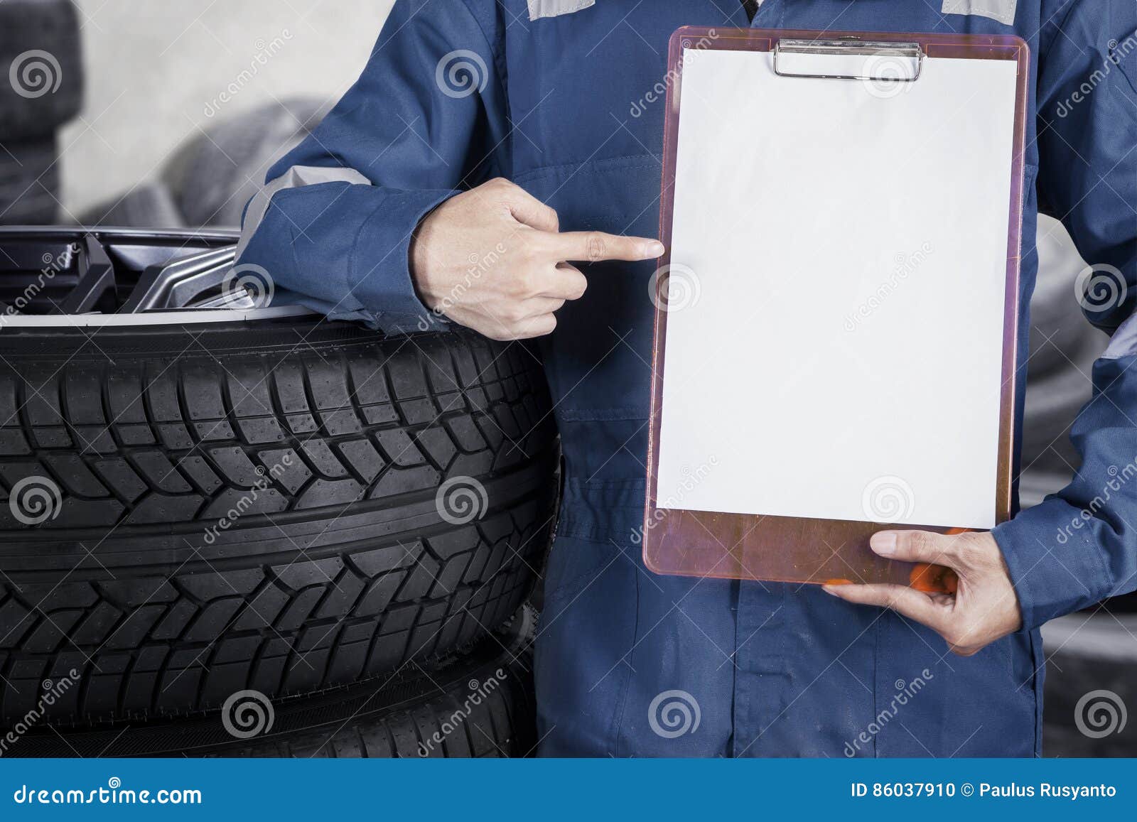 Mechanic Pointing To Clipboard Stock Photo - Image of holding, repair ...