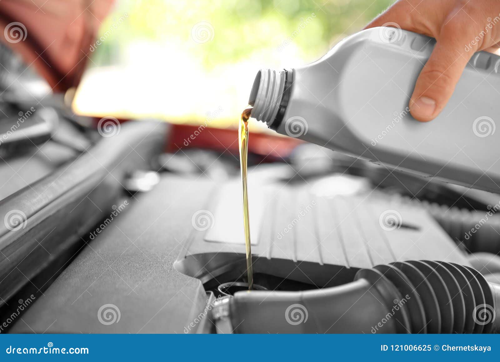 Mechanic Pouring Oil into Car Engine Stock Image - Image of automobile ...