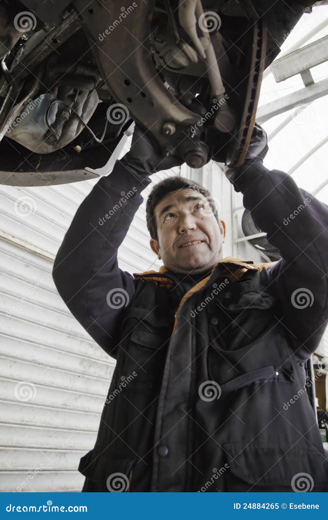 Mechanic repairing a car stock image. Image of service - 24884265