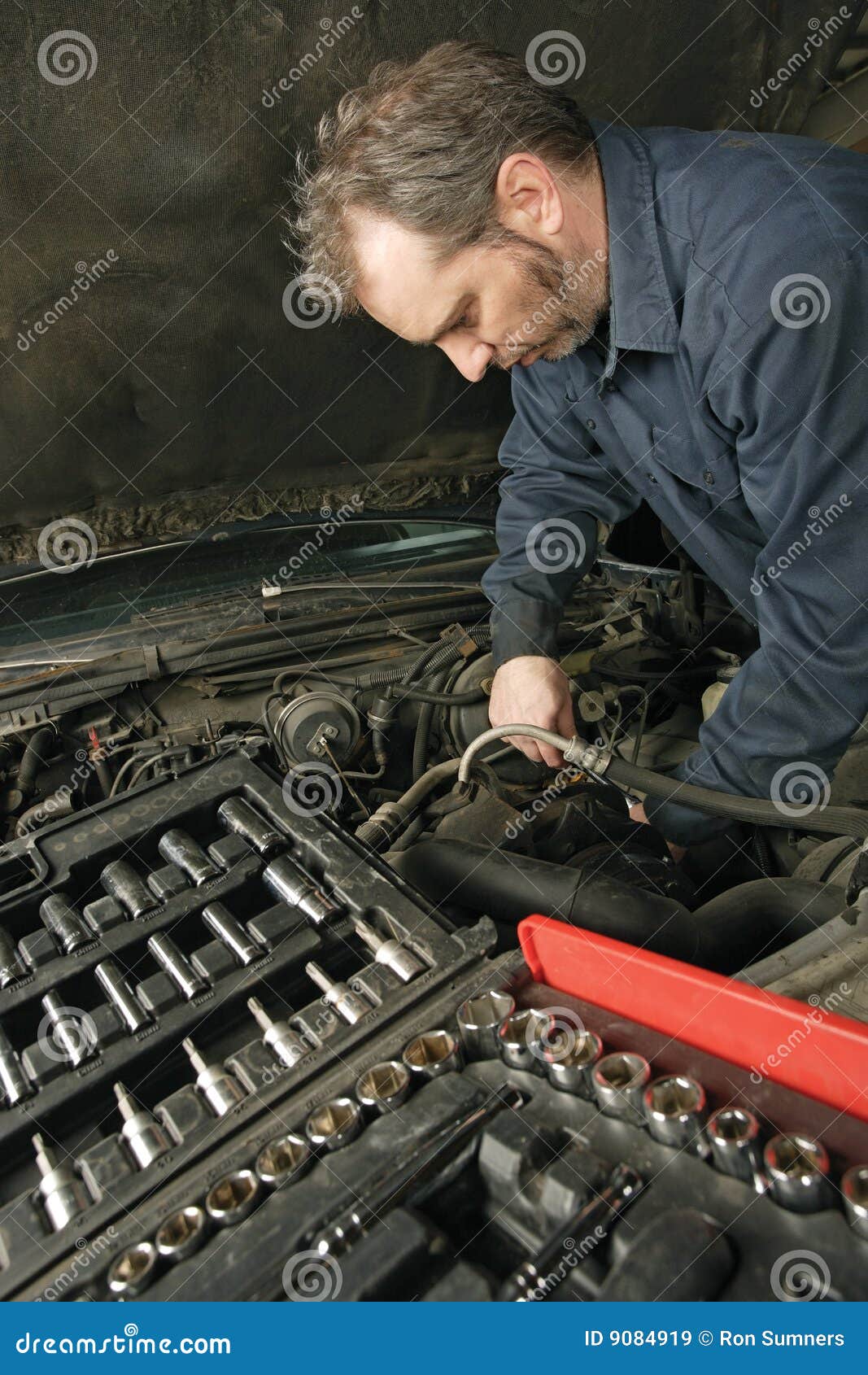 Mechanic Repairing an Engine Stock Image - Image of mechanical, dirty ...