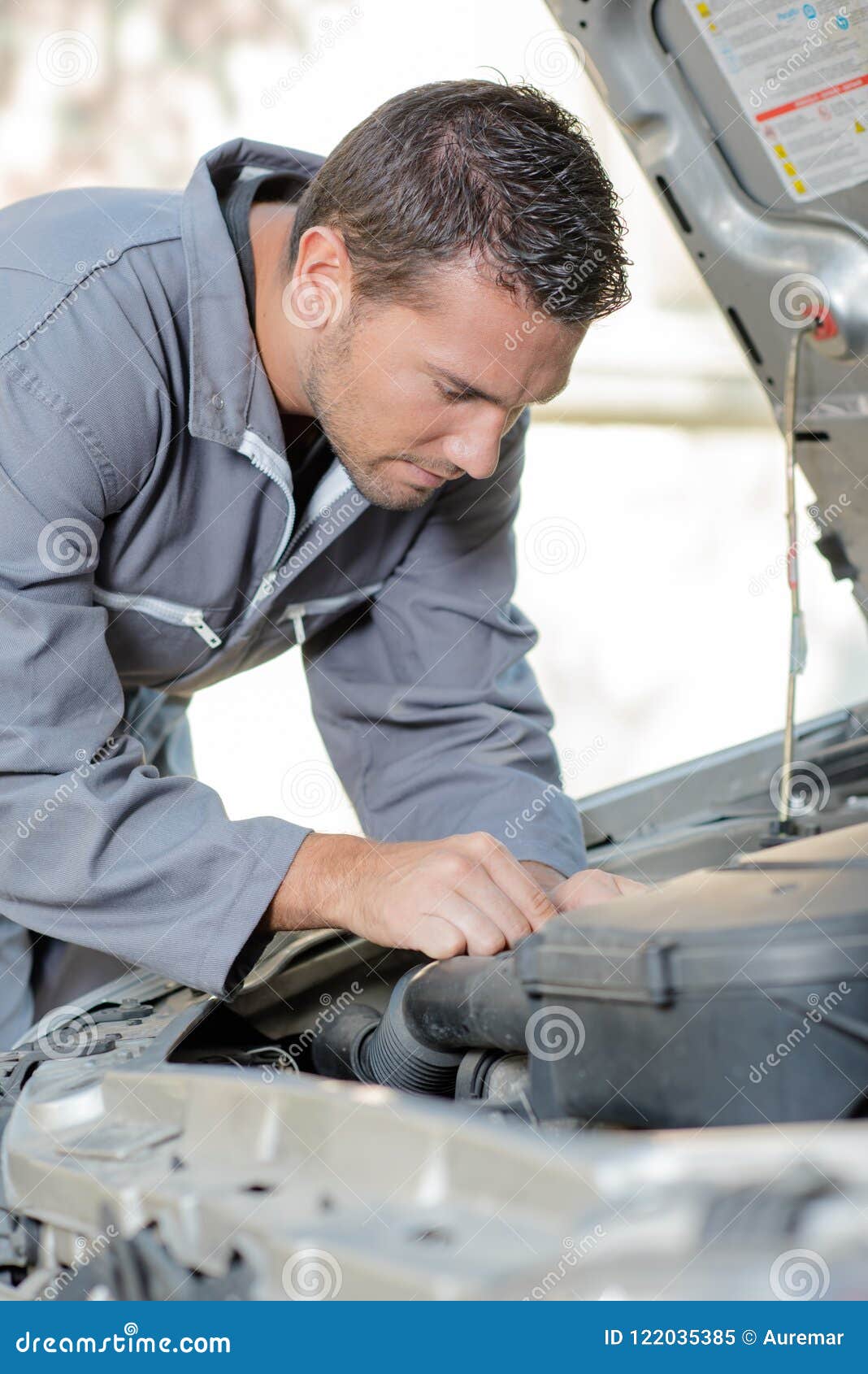 Mechanic Repairing an Engine Stock Image - Image of manual, restore ...