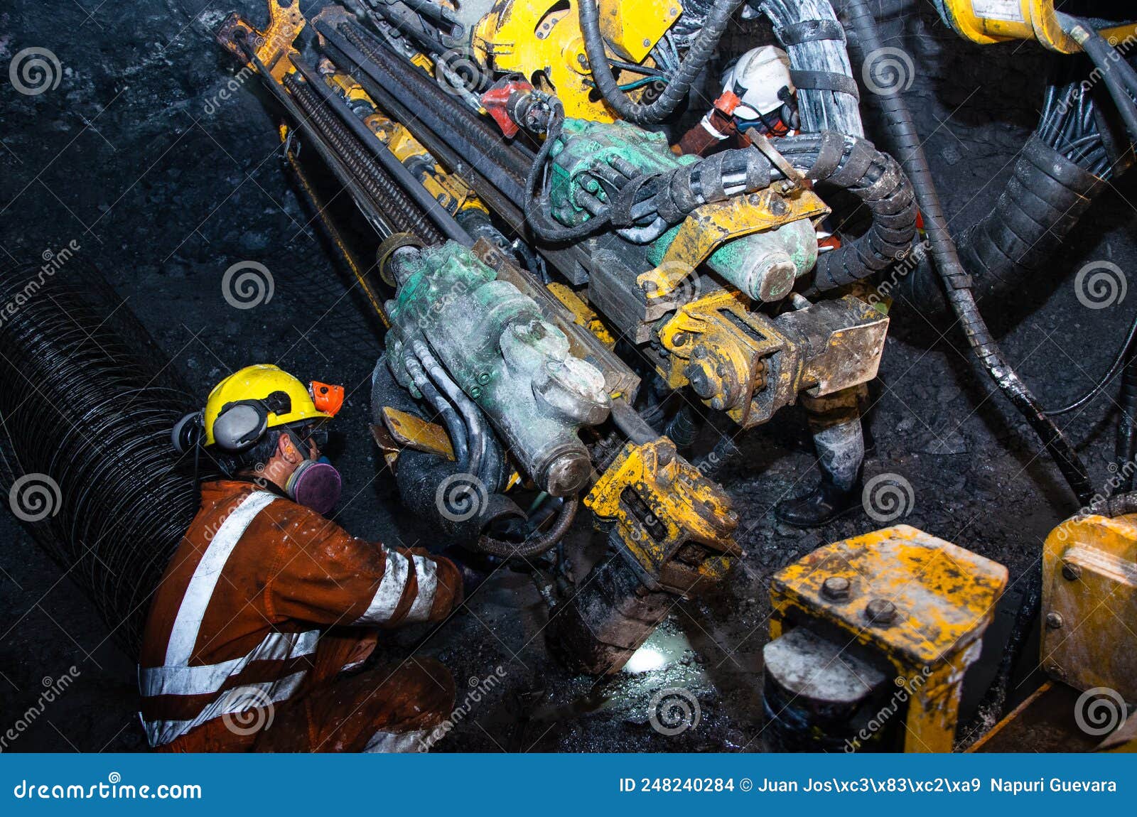 Mechanic Repairing a Mining Machine. Stock Photo - Image of tool ...