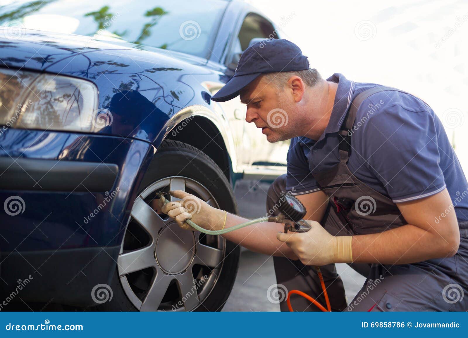 Mechanic Repairman Making Tyre in Workshop Stock Photo - Image of ...