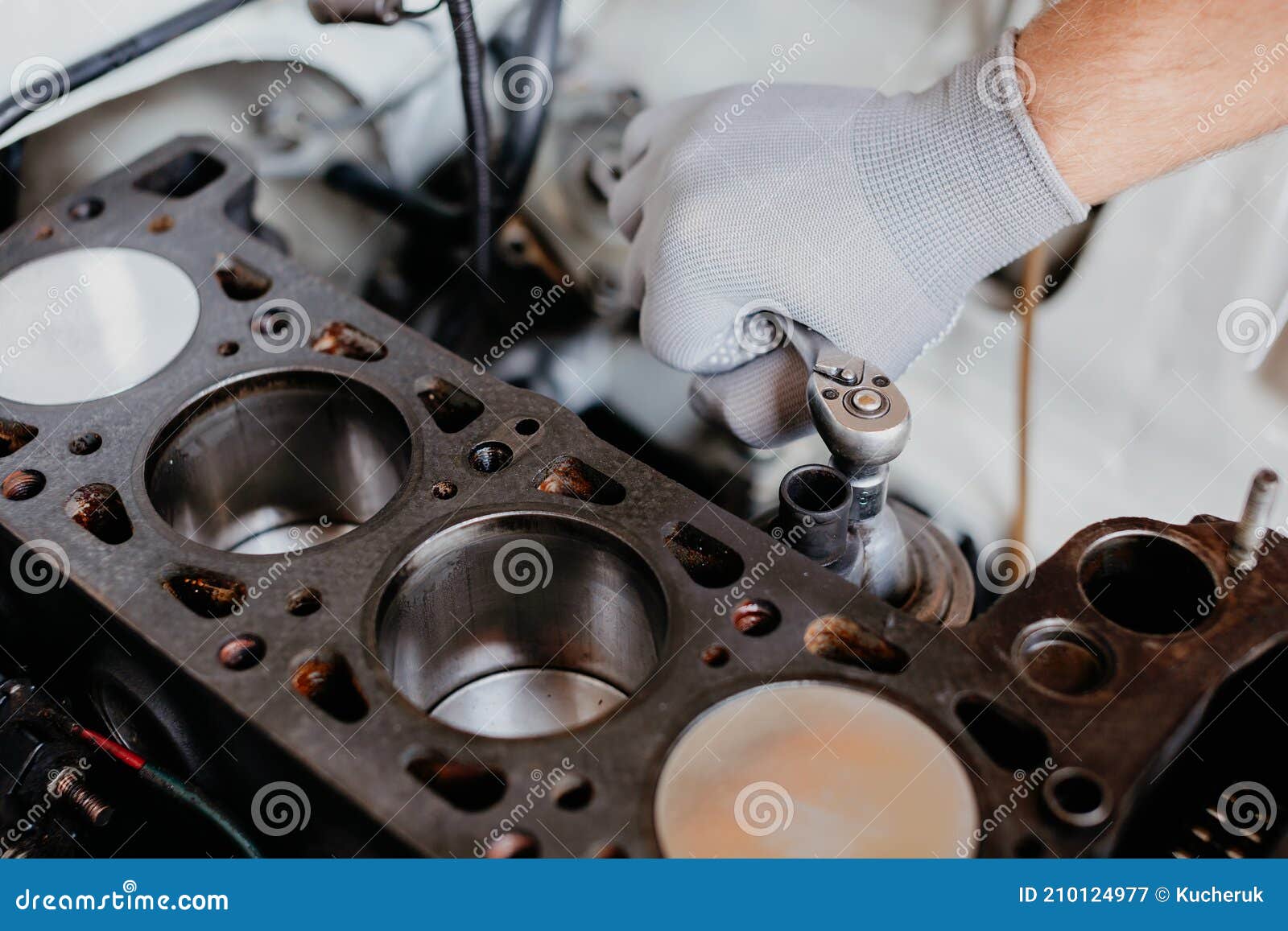 The Mechanic Replaces the Timing Chain on the Four-cylinder Engine ...