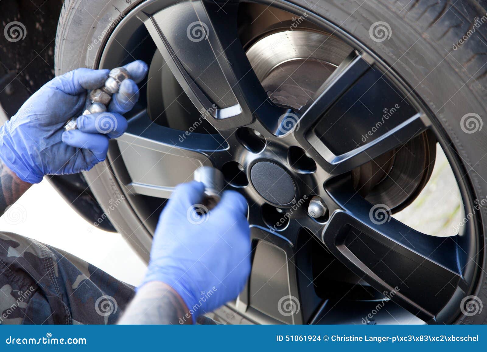 Mechanic Replacing the Plastic Wheel Stock Photo - Image of service ...