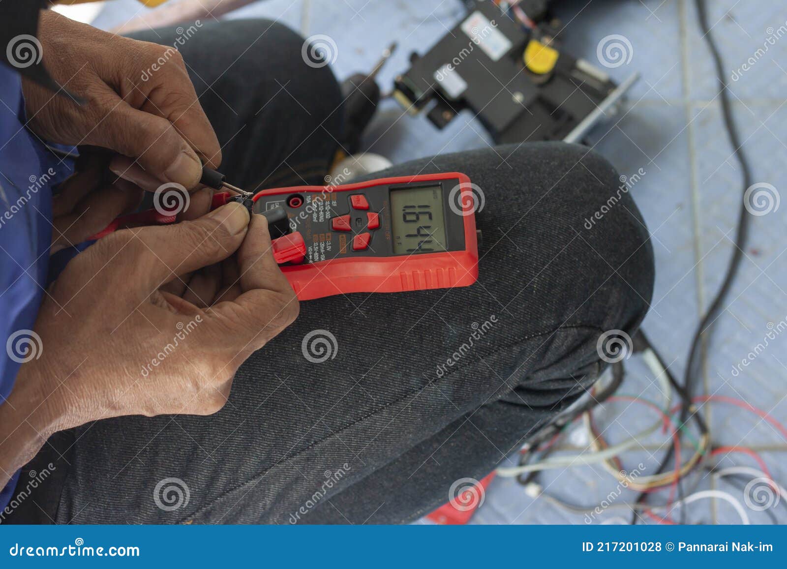 Mechanic`s Hand is Checking the Voltmeter. Stock Photo - Image of ...