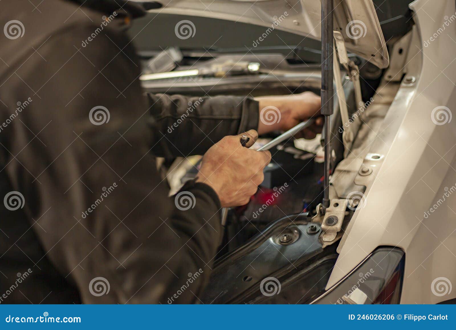 Mechanic`s Hands Adjust the Hydrogen System Control Unit in the Car ...