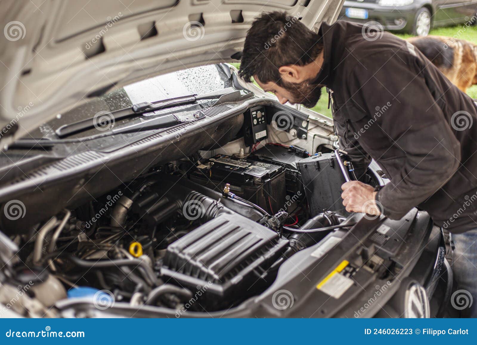 Mechanic`s Hands Adjust the Hydrogen System Control Unit in the Car ...