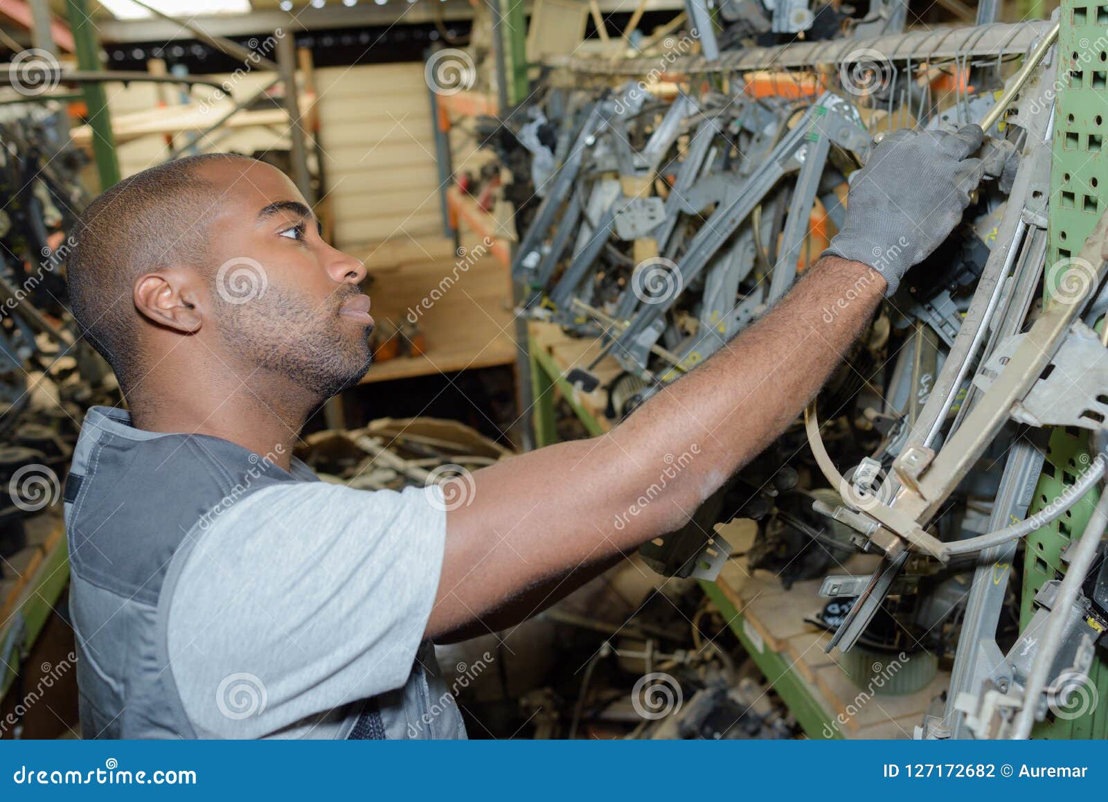 Mechanic with Second Hand Parts Stock Photo - Image of second ...