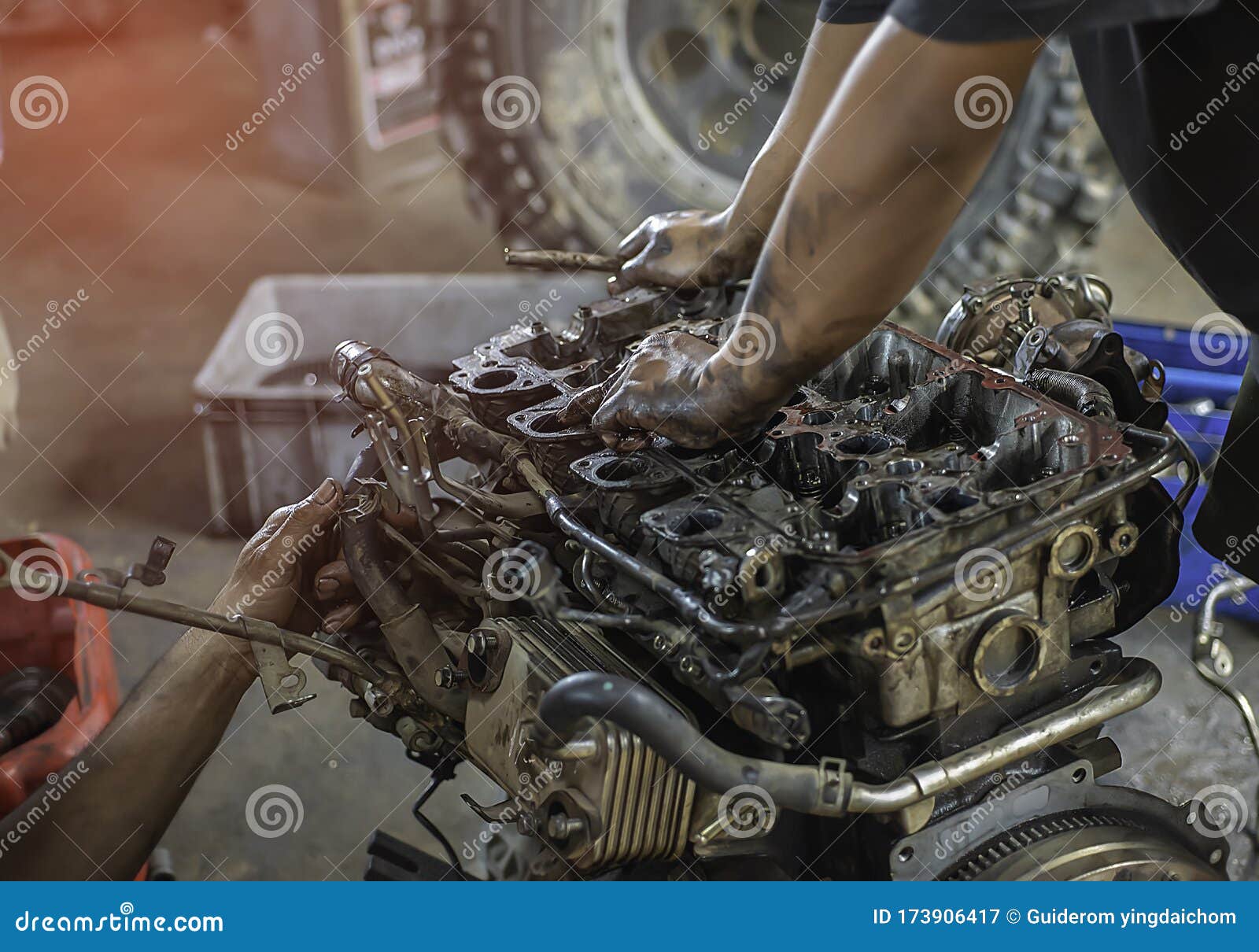 The Mechanic is Setting Up the Engine Stock Image - Image of effect ...
