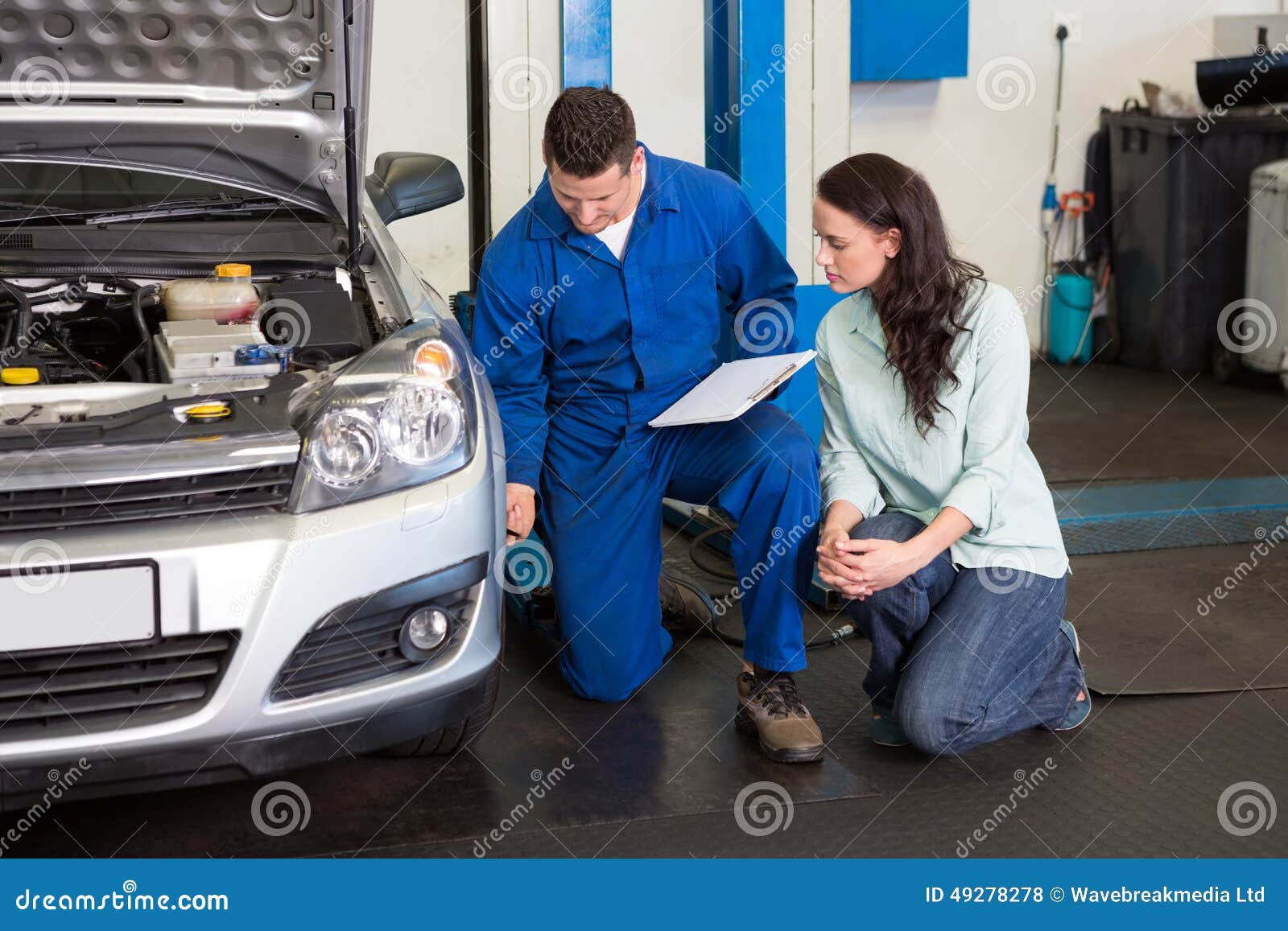 Mechanic Showing Customer the Problem with Car Stock Photo - Image of ...