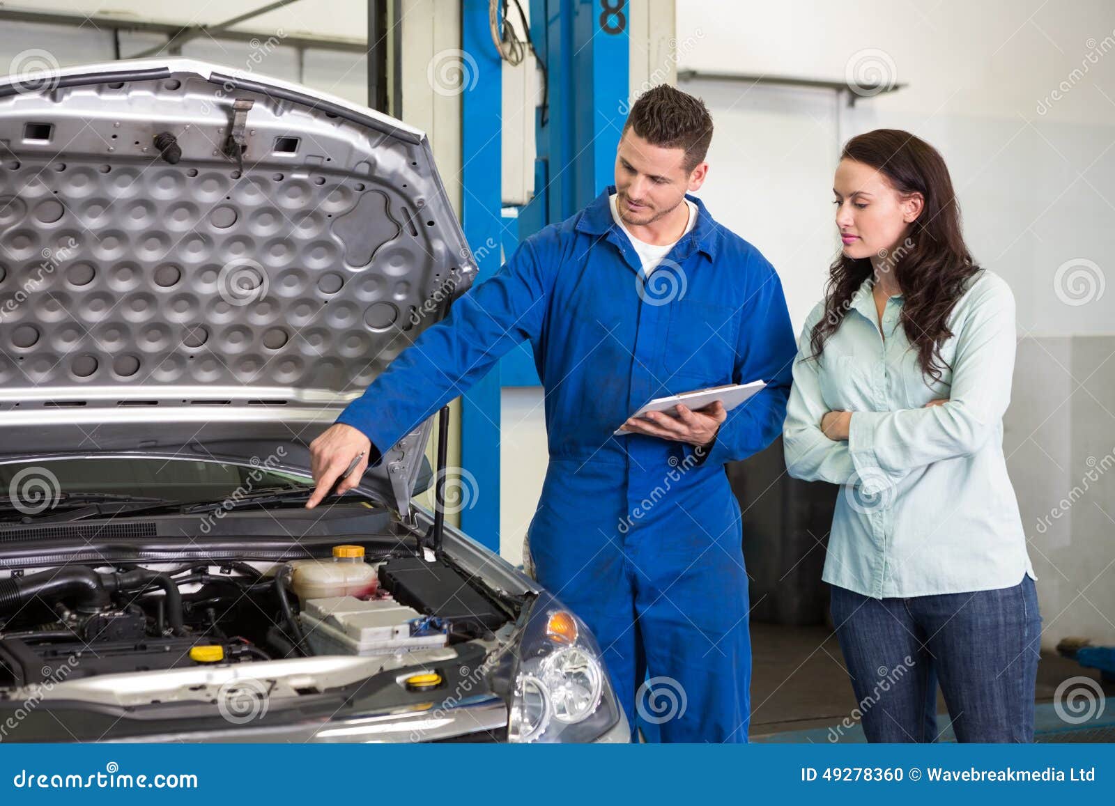 Mechanic Showing Customer the Problem with Car Stock Photo - Image of ...