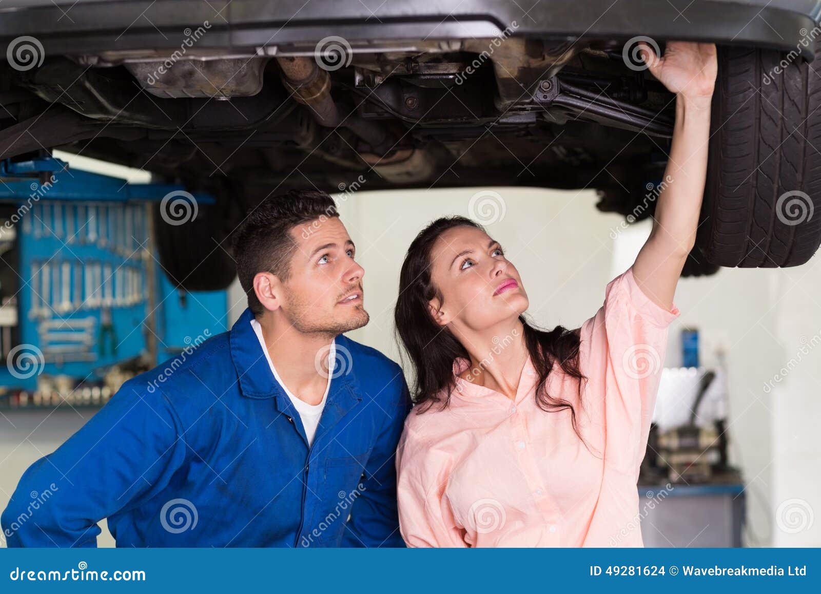 Mechanic Showing Customer the Problem with Car Stock Photo - Image of ...