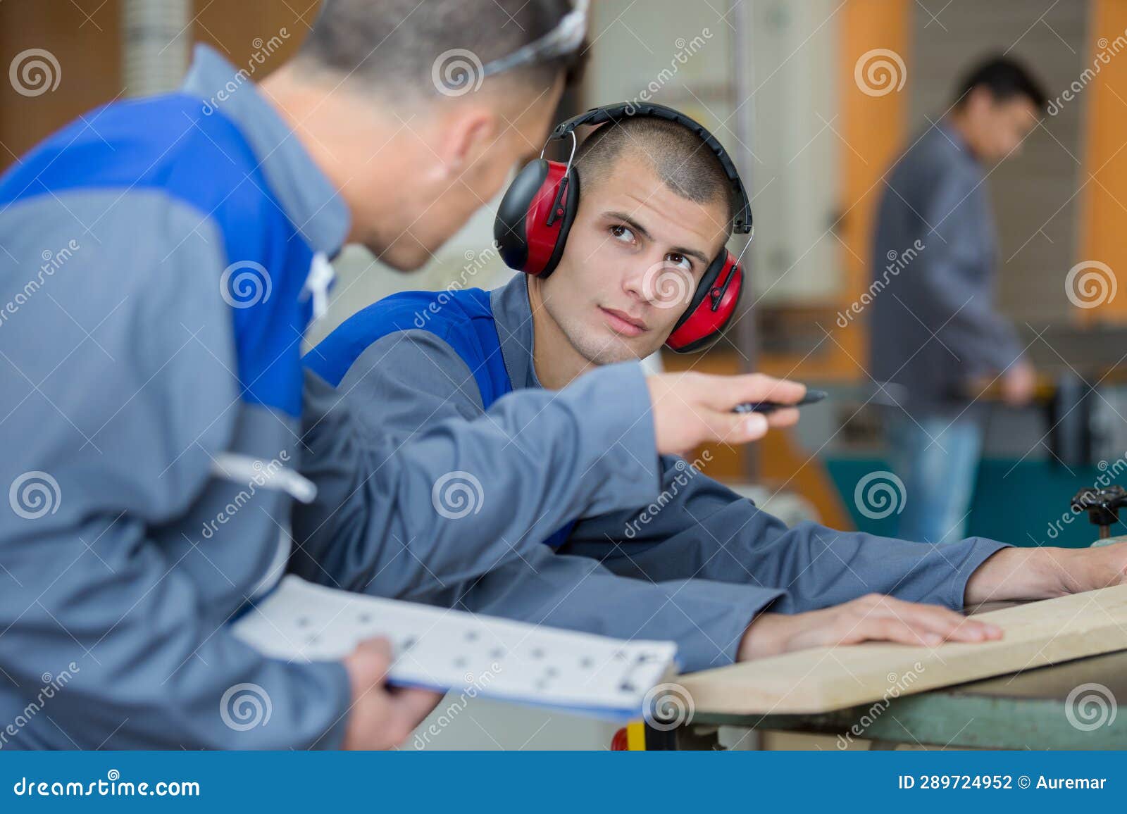 Mechanic Showing Parts Engine To Apprentice Stock Photo - Image of ...