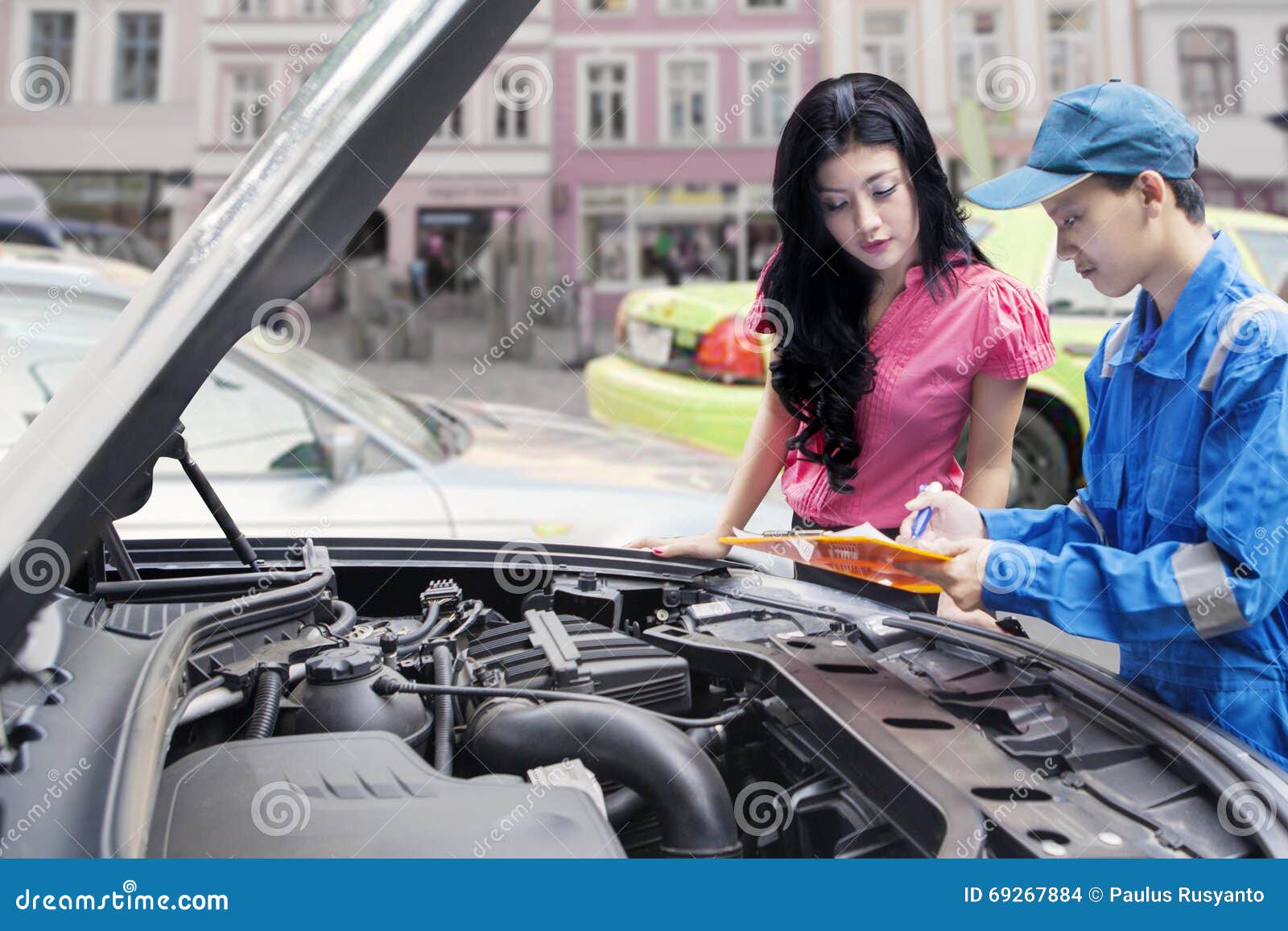 Mechanic Shows the Car Problem on His Client Stock Photo - Image of ...