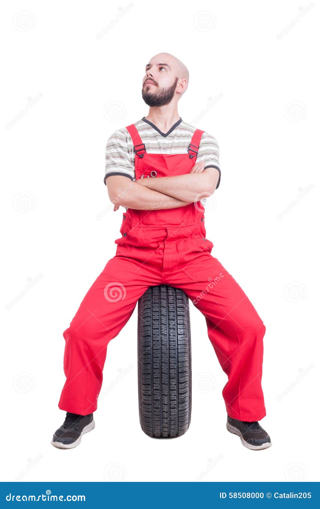 Mechanic Sitting on Car Wheel Isolated on White Stock Photo - Image of ...