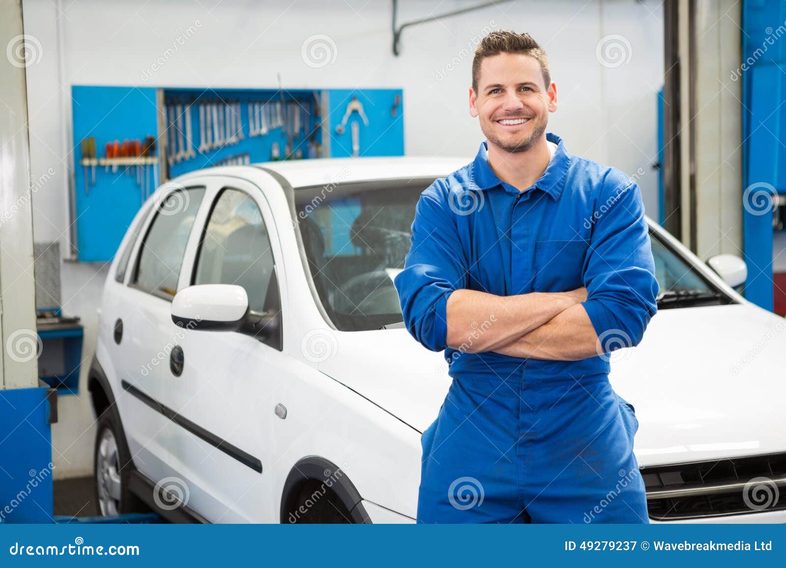 Mechanic Smiling at the Camera Stock Image - Image of work, crossed ...