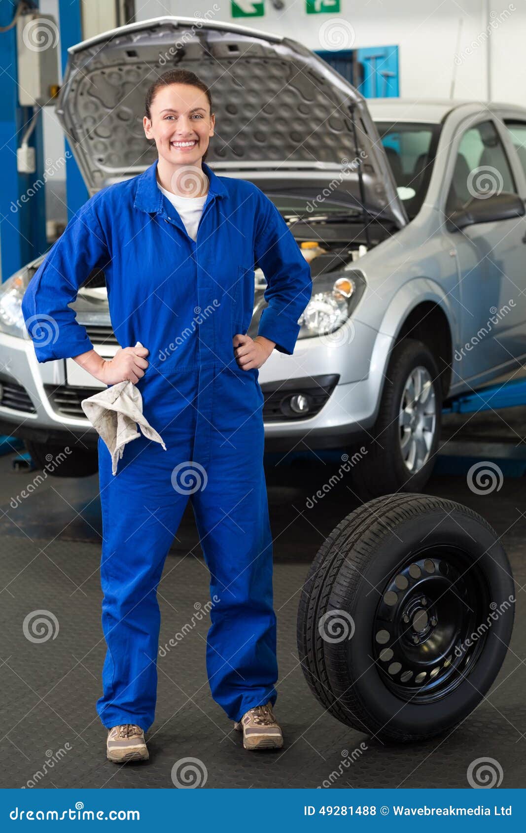 Mechanic Smiling at the Camera Stock Photo - Image of engine, woman ...