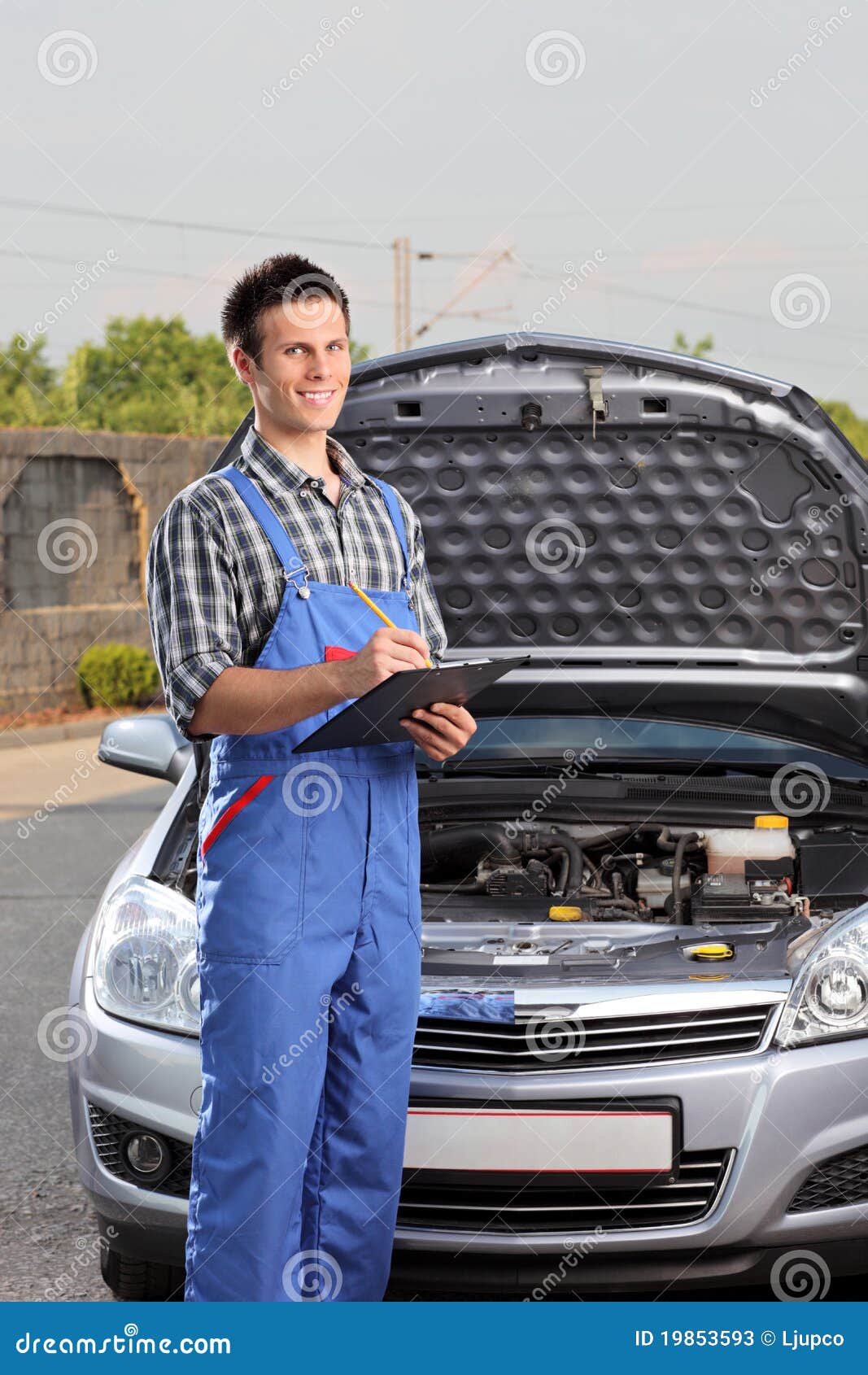 Mechanic Standing Next To a Car with Open Hood Stock Image - Image of ...
