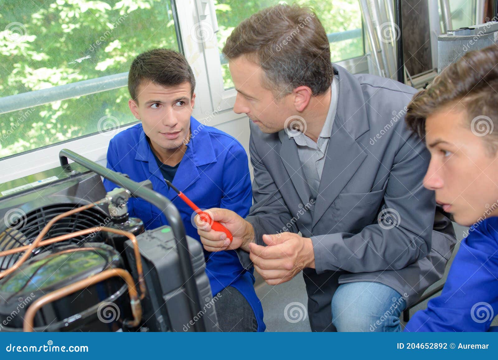 Mechanic Students with Their Teacher Stock Photo - Image of work ...