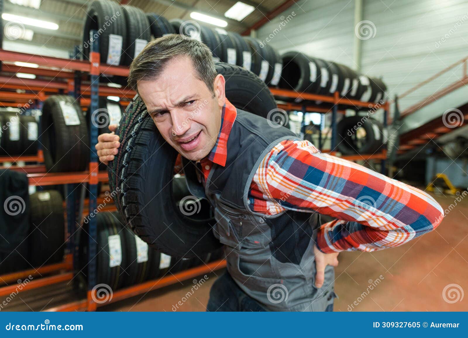 Mechanic Suffering Lower Back or Lumbar Area Pain Stock Image - Image ...