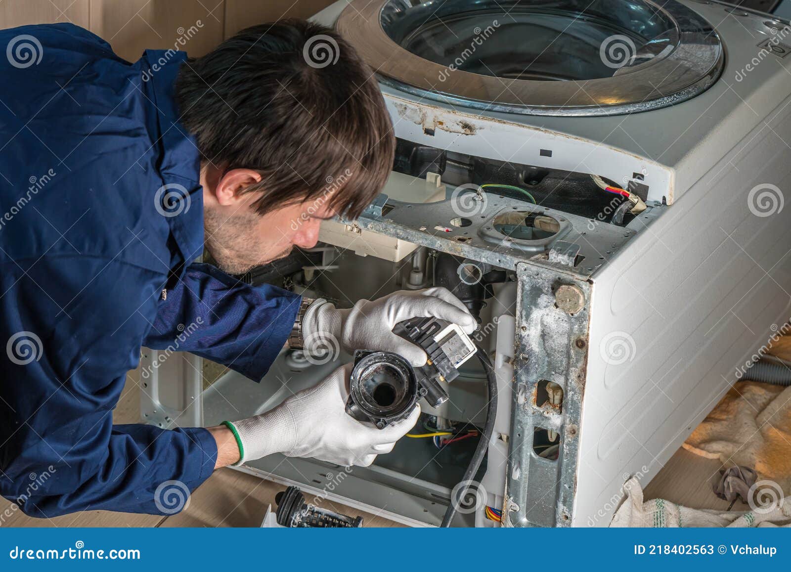 Mechanic or Technician is Repairing Old Washing Machine. Stock Image ...