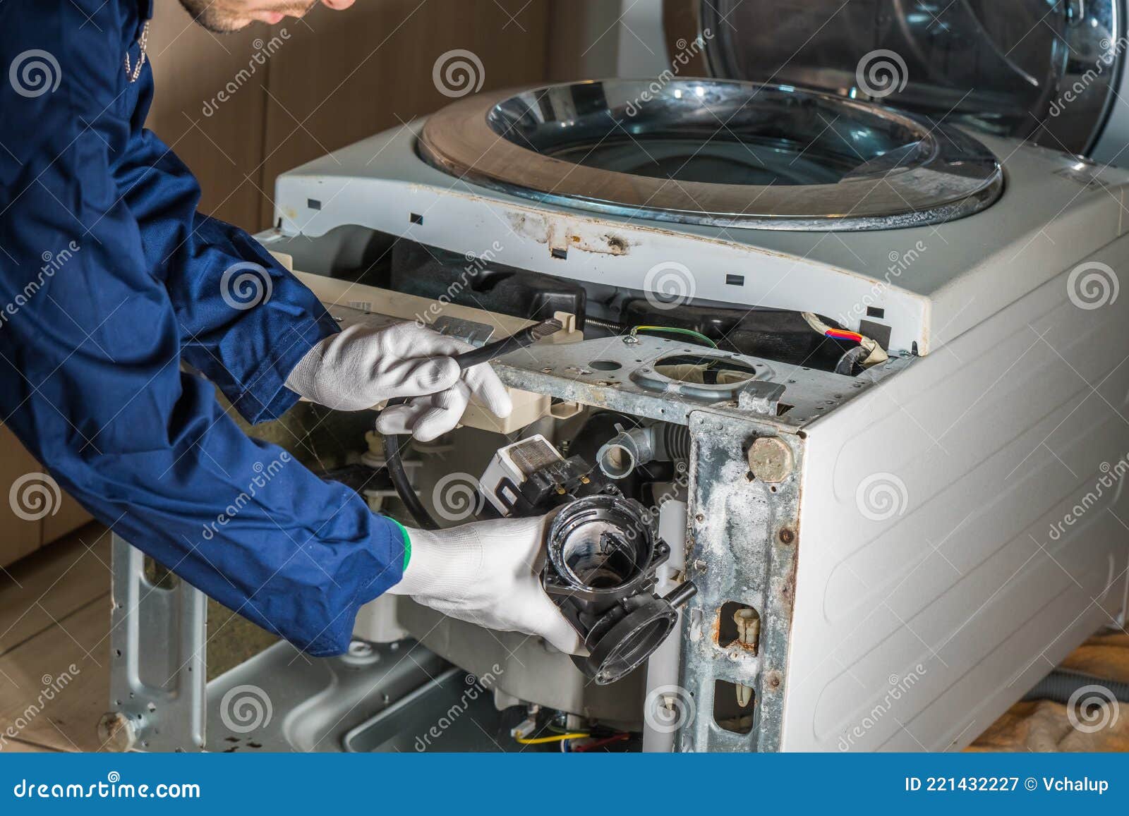 Mechanic or Technician is Repairing Old Washing Machine. Stock Image ...