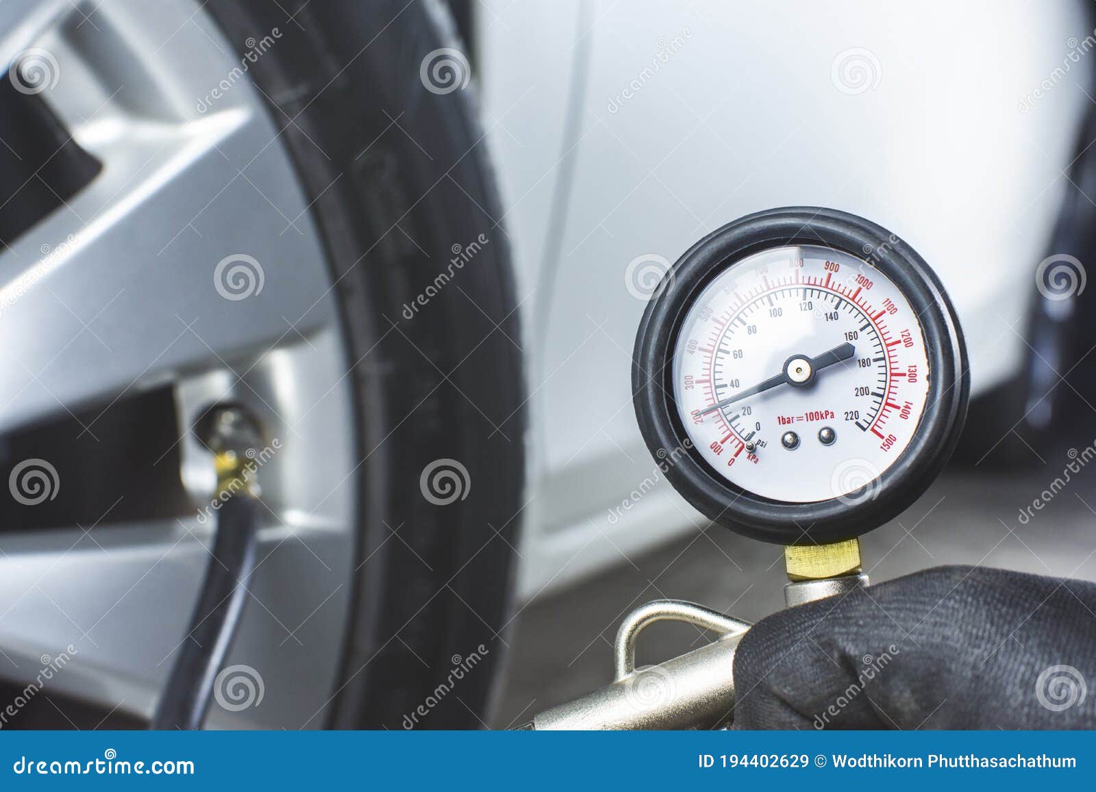 Mechanic Testing the Tire Pressure Stock Image - Image of tool ...
