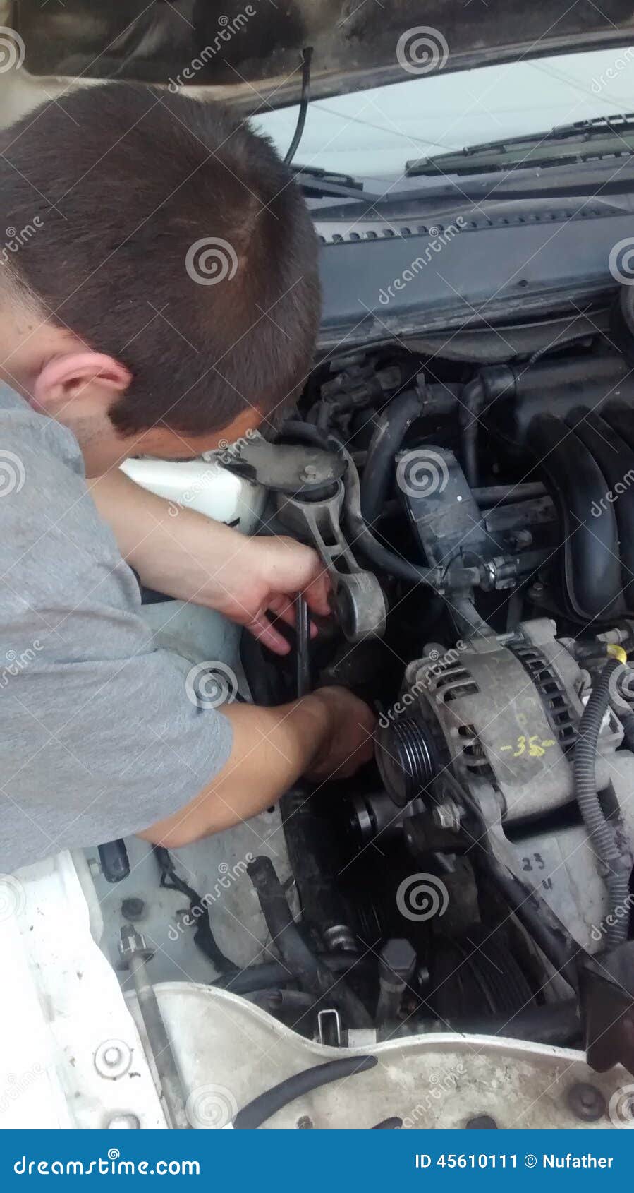 Mechanic in training editorial photo. Image of young - 45610111