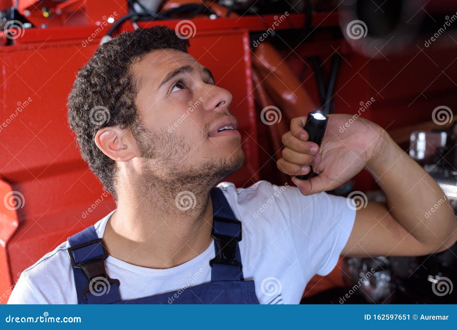 Mechanic Under Truck Reparing Dirty Greasy Oily Engine With Prob ...