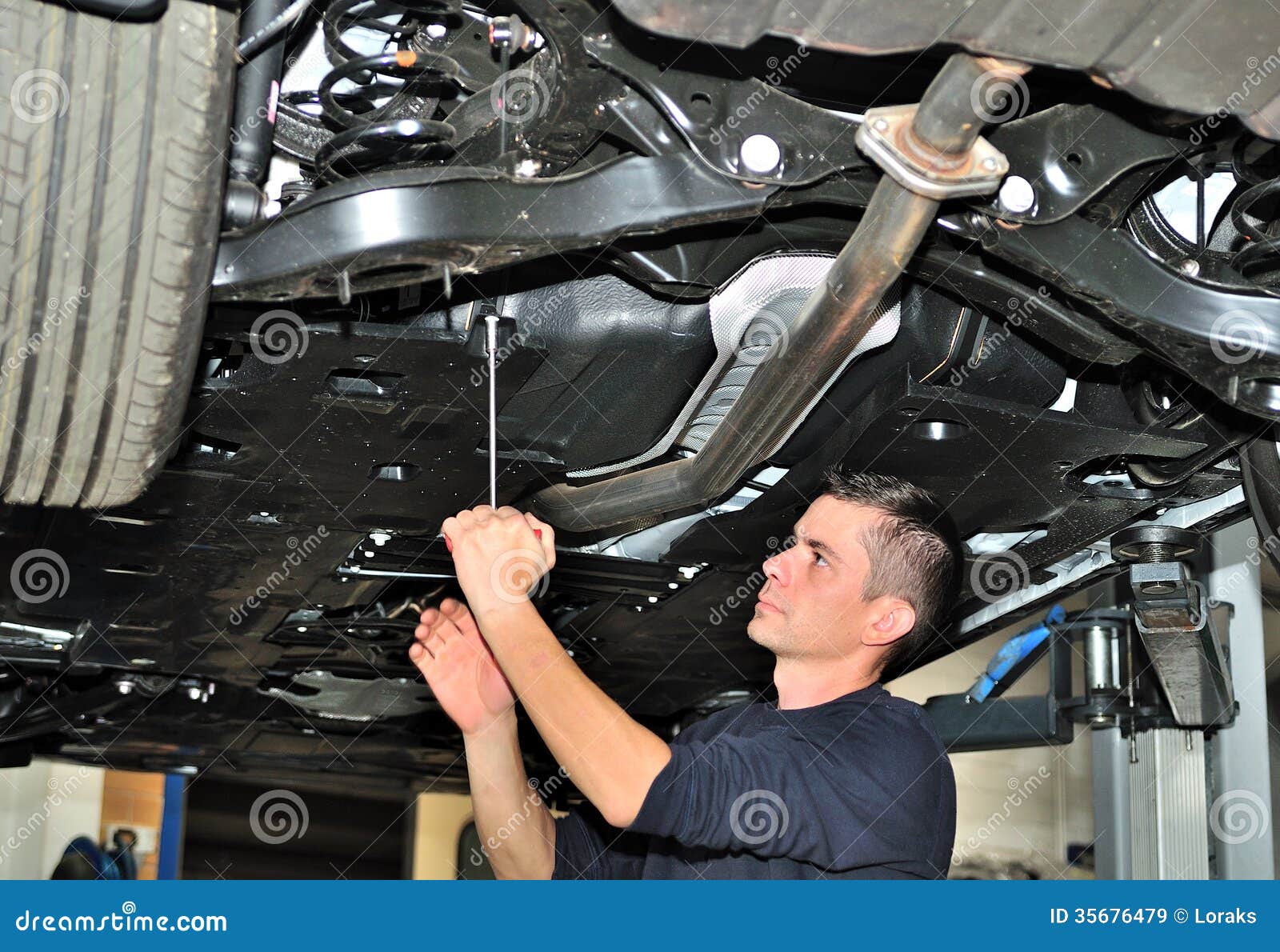 Mechanic under car. stock image. Image of diagnostic - 35676479