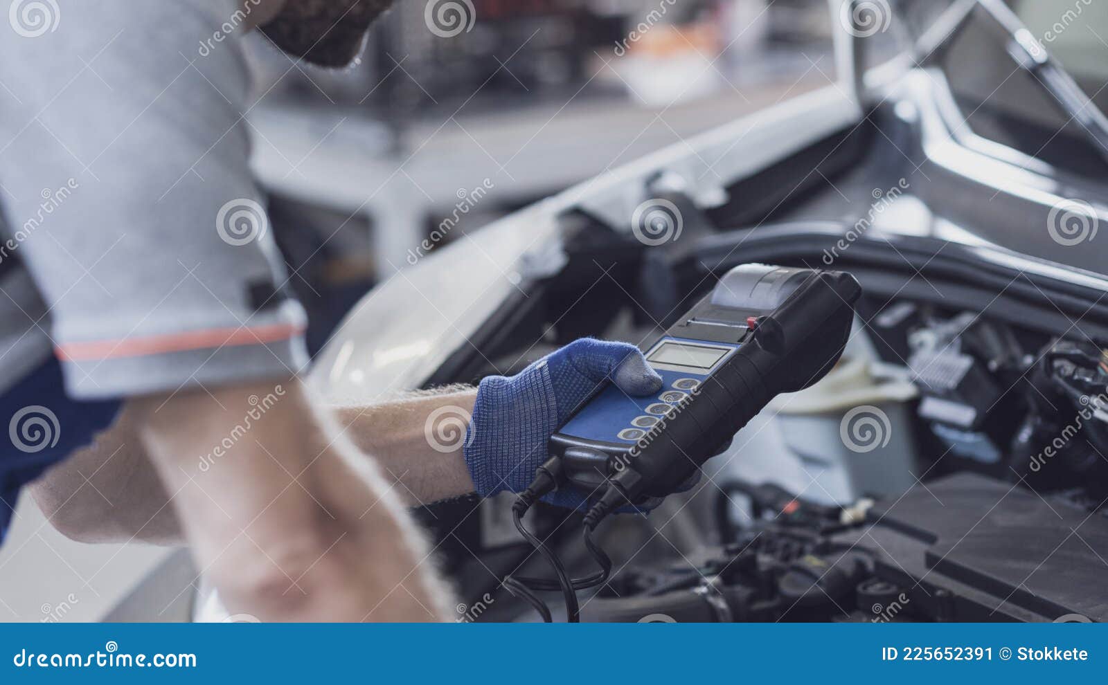 Mechanic Using a Battery Tester Stock Image - Image of engine ...