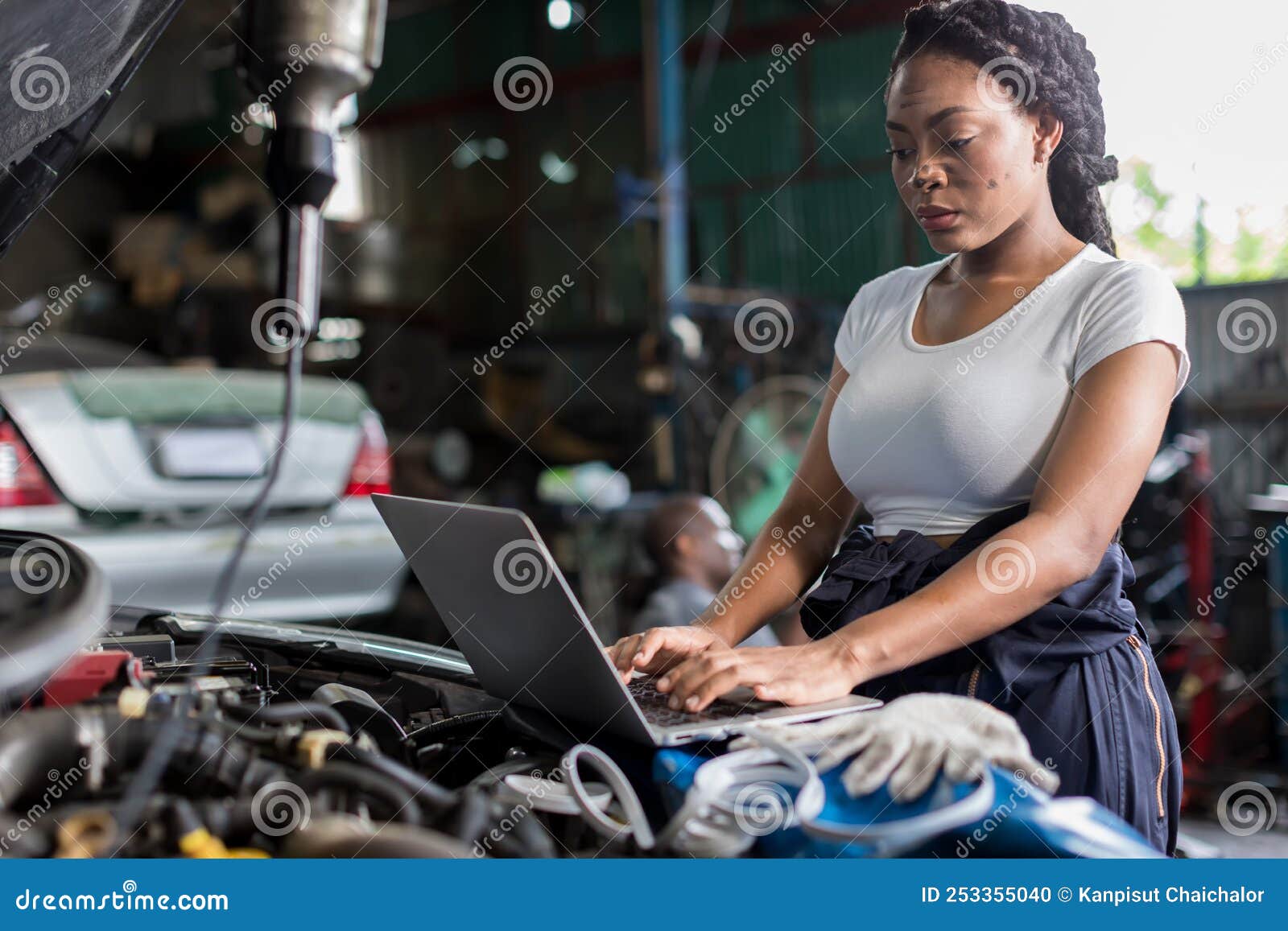 Mechanic Using Compute for Diagnostic Machine Tools Ready To Be Used ...