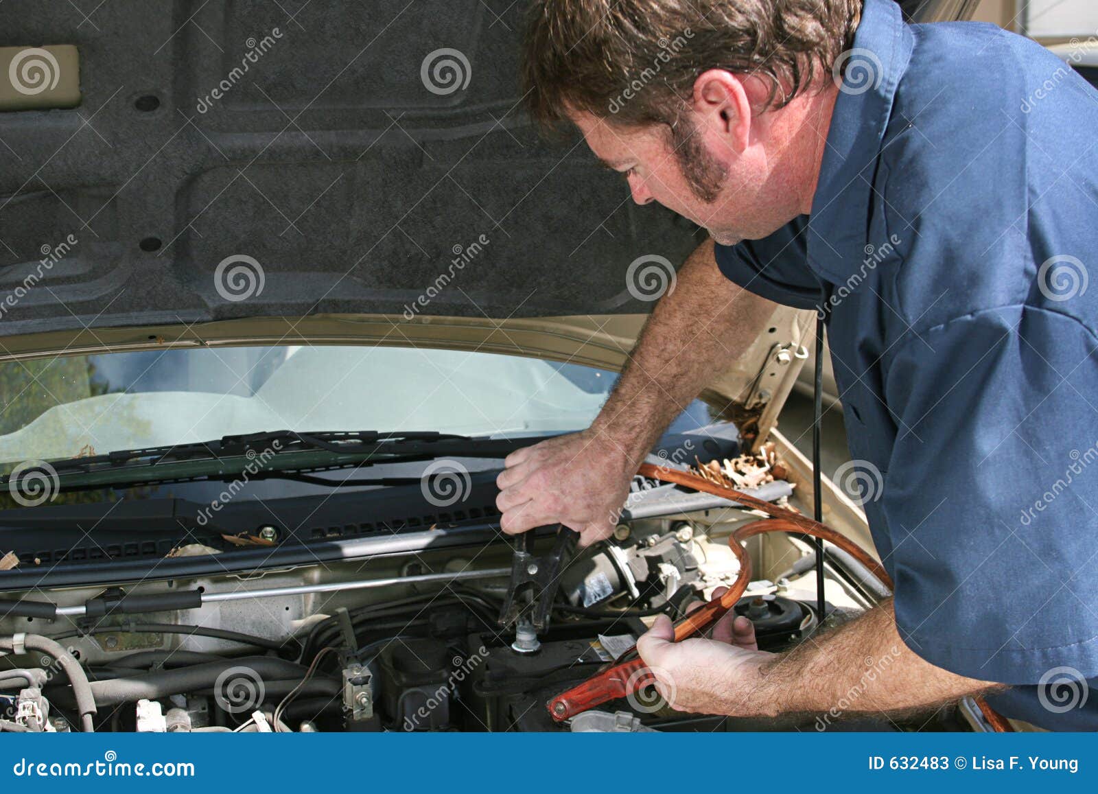 Mechanic Using Jumper Cables Stock Image - Image of person, labor: 632483