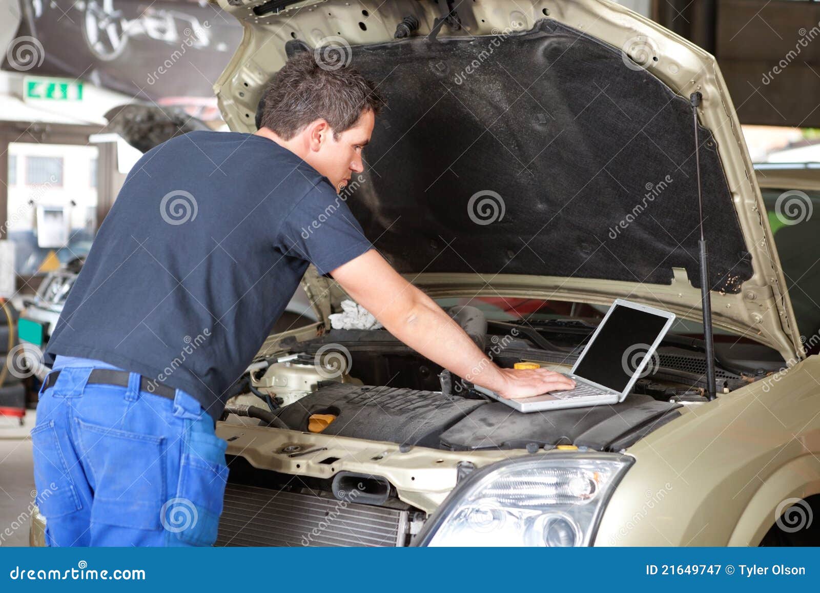 Mechanic using laptop stock image. Image of open, automobile - 21649747