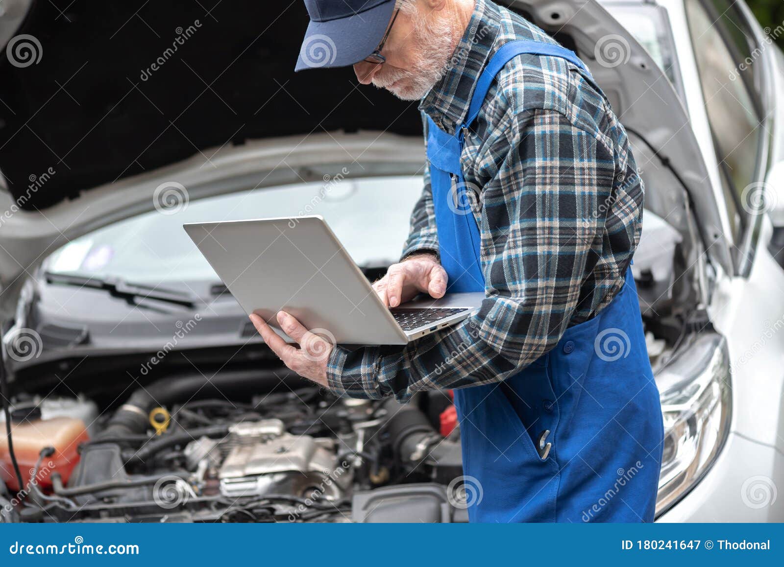 Mechanic Using Laptop for Checking Car Engine Stock Image - Image of ...