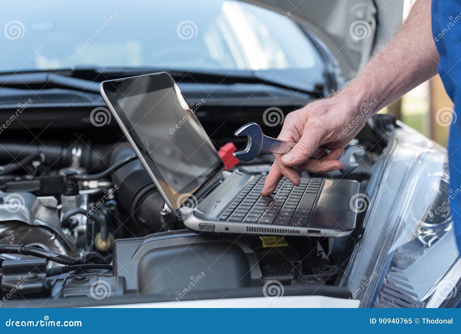 Mechanic Using Laptop for Checking Car Engine Stock Image - Image of ...