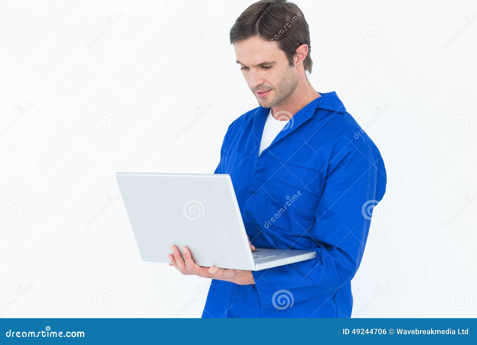 Mechanic Using Laptop Over White Background Stock Photo - Image of ...