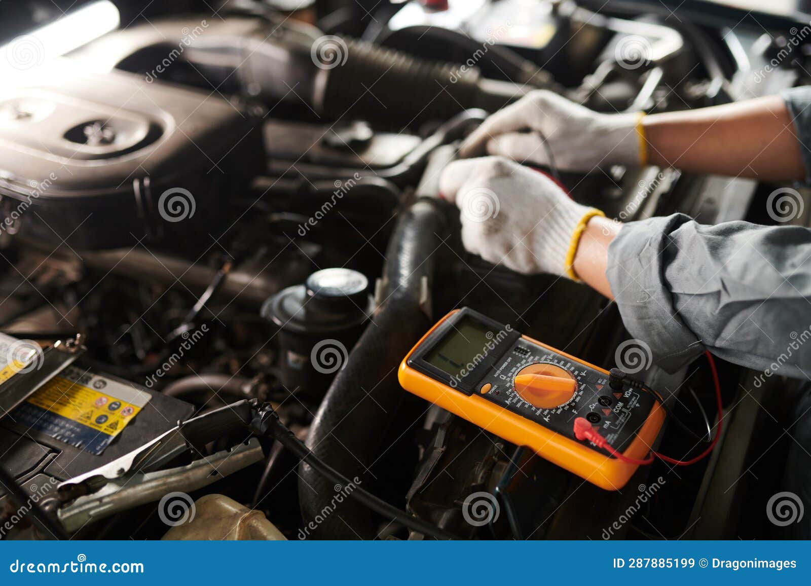 Mechanic Using Multimeter stock image. Image of technician - 287885199