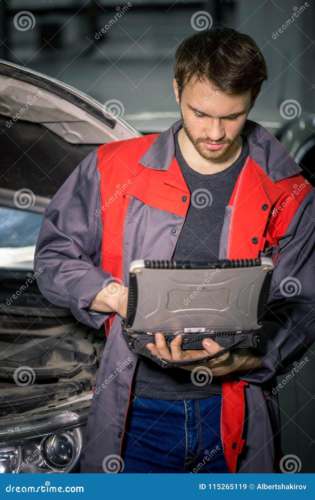 Mechanic Examining Car Engine with Help of Laptop Editorial Stock Image ...